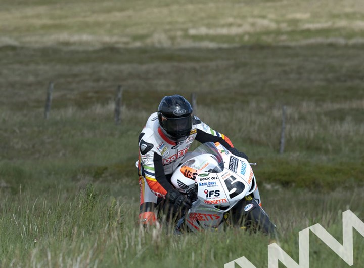 Bruce Anstey TT 2011 on the throttle through Brandywell. : Duke Video